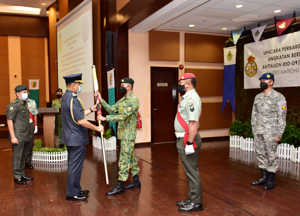 News - FLAG HANDING OVER CEREMONY OF RBAF PERSONNEL...